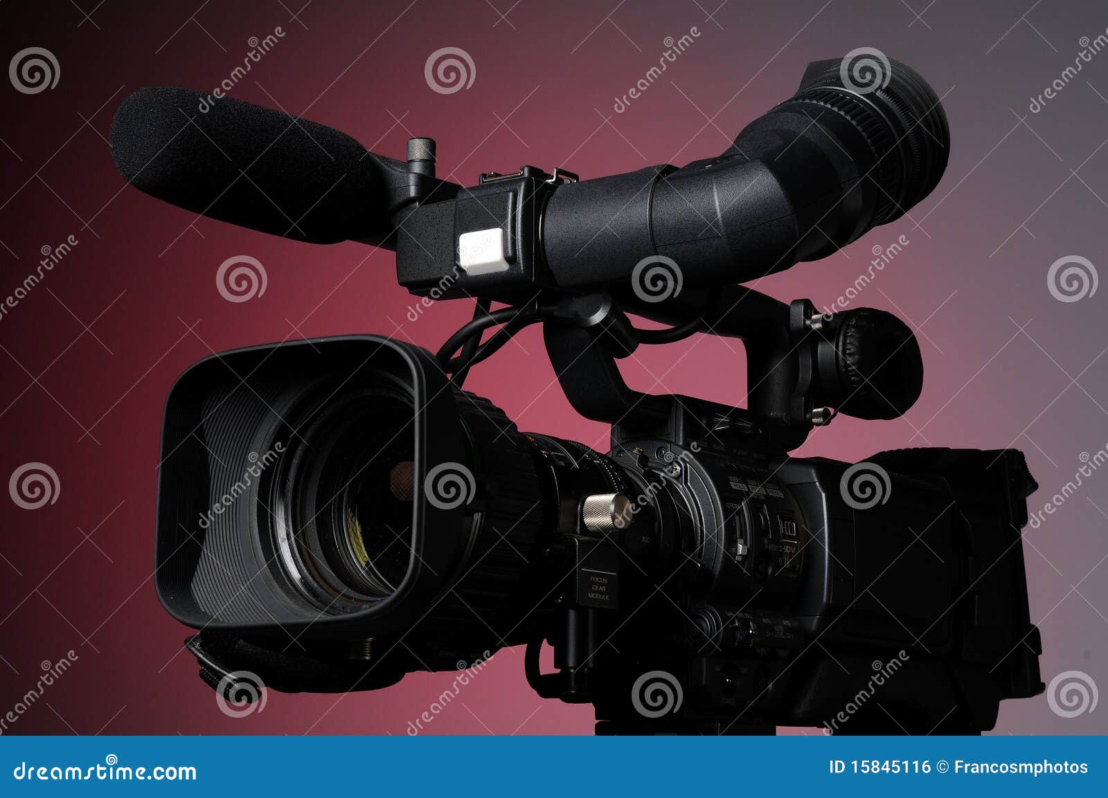 Professional Video Camera Stands On A Tripod, The Process Of Filming A ...