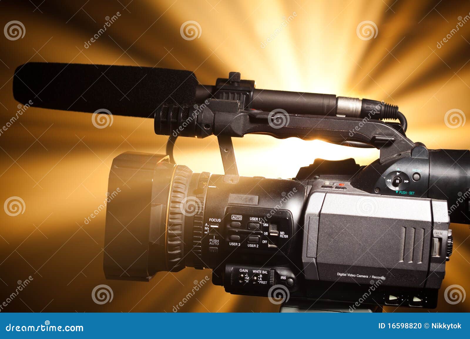 Professional Video Camera Stands On A Tripod, The Process Of Filming A ...