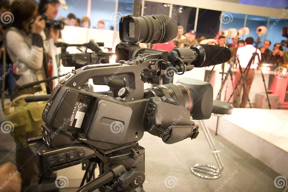 Professional video camera stock photo. Image of crowd - 2452306