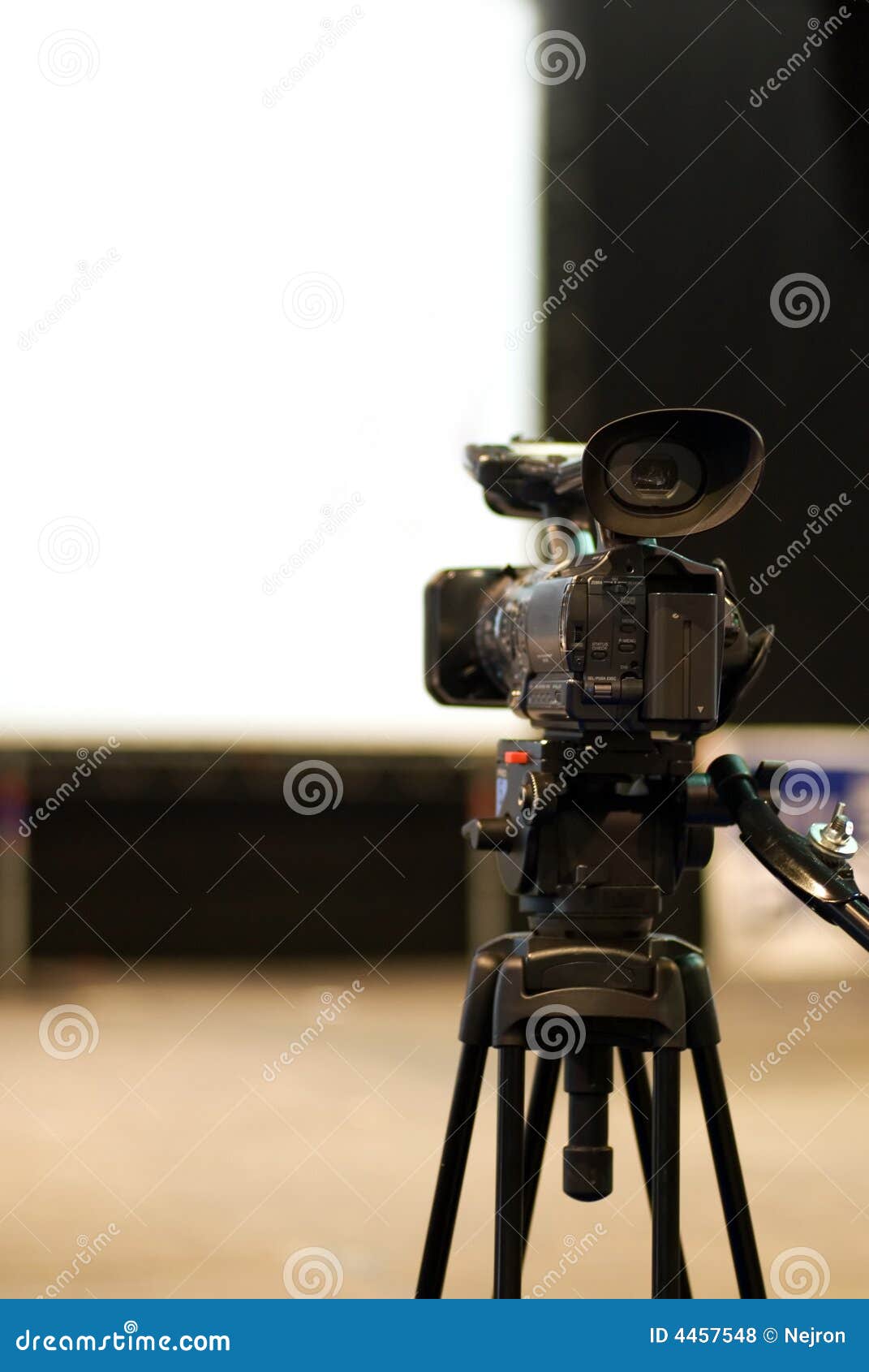 Professional Video Camera Stands On A Tripod, The Process Of Filming A ...