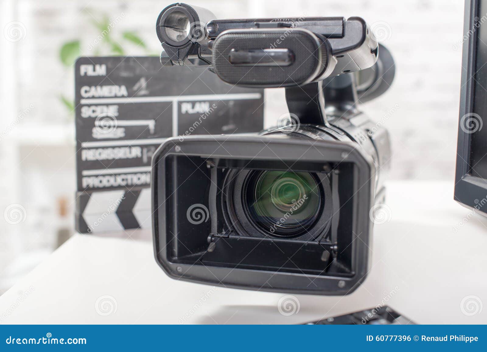 Professional Video Camera with a Clapperboard Stock Photo - Image of ...