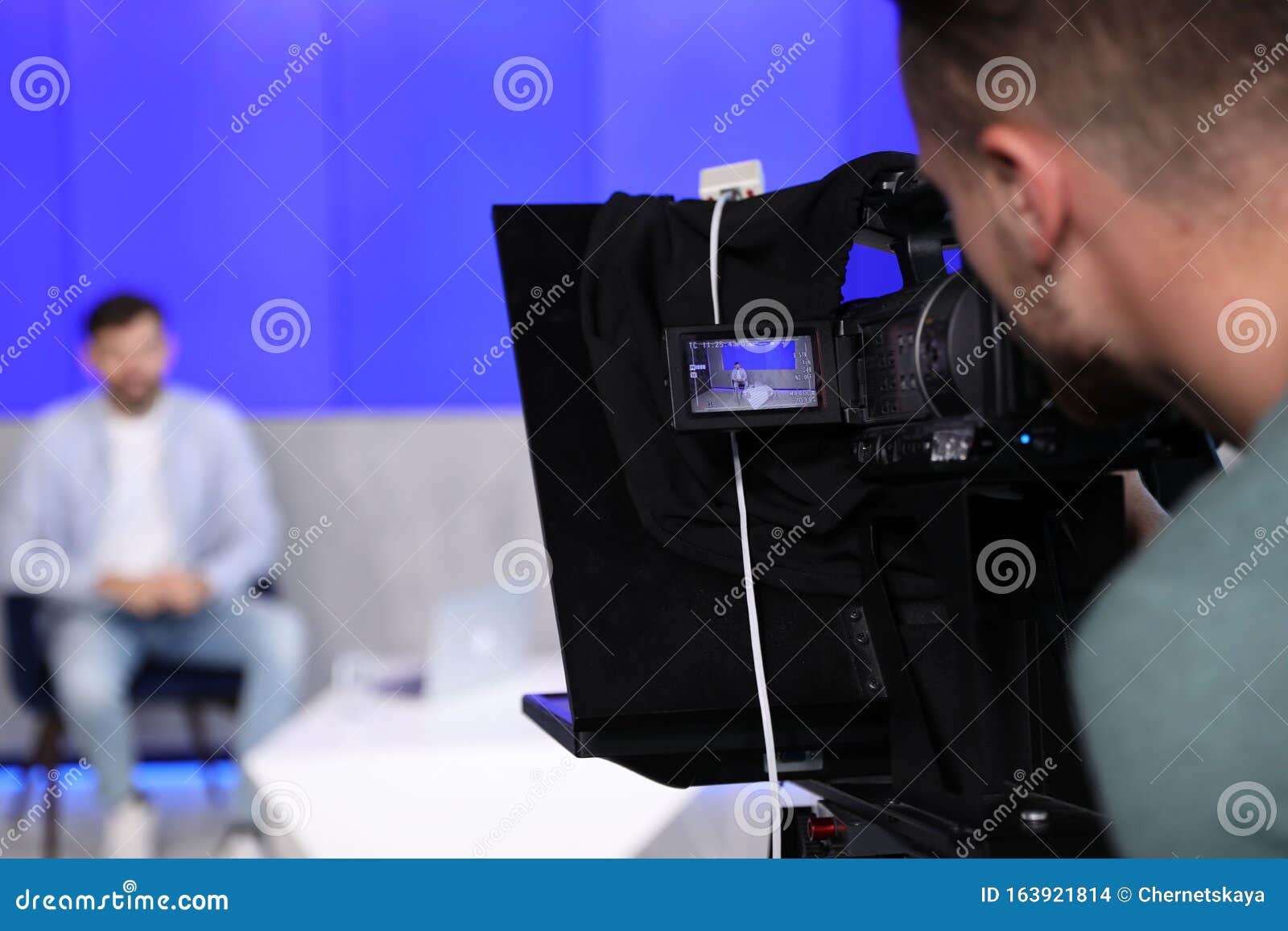 Professional Video Camera Operator Working in Studio Stock Photo ...