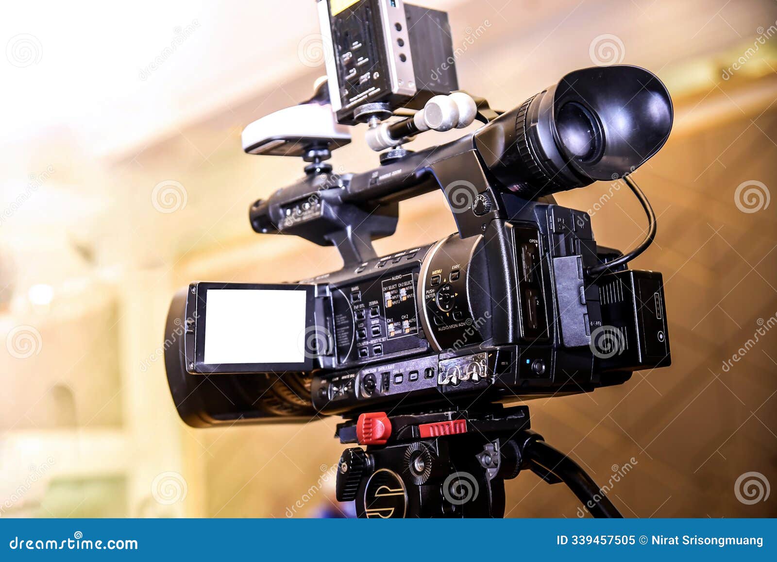 Professional Video Camera on a Tripod with Blank Screen for Your Text ...