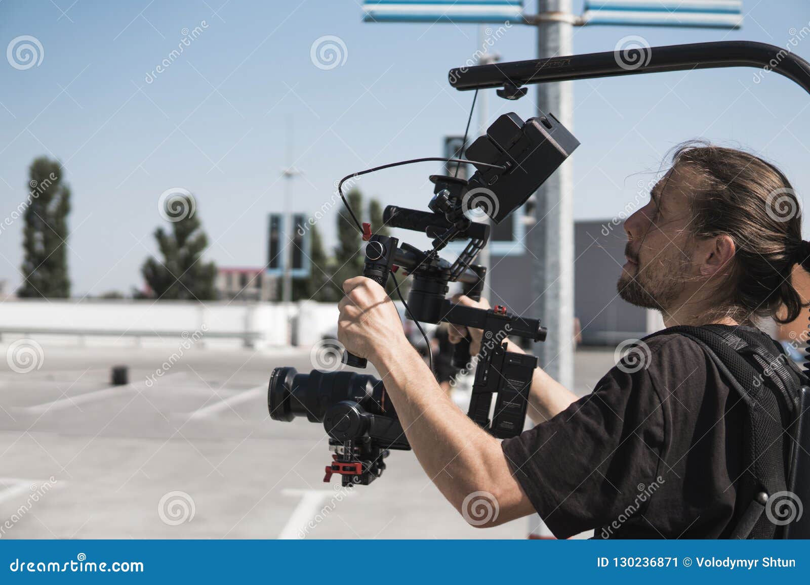 Professional Videographer Holding Camera on 3-axis Gimbal Which Mounted ...