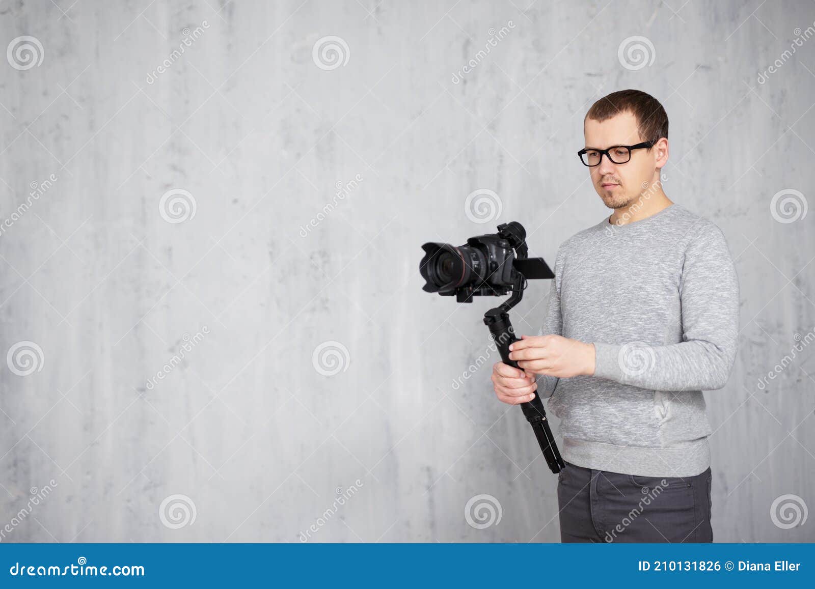 Professional Videographer Shooting Video Using Modern Dslr Camera on 3 ...