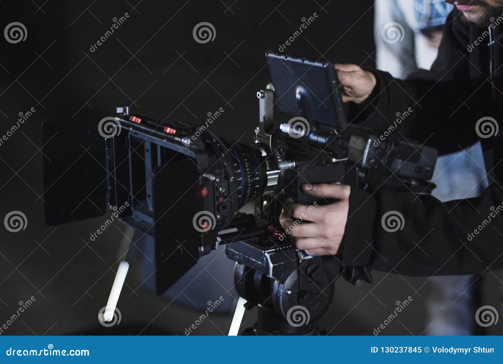 Professional Videographer Using Cinema Digital Video Camera. Stock ...