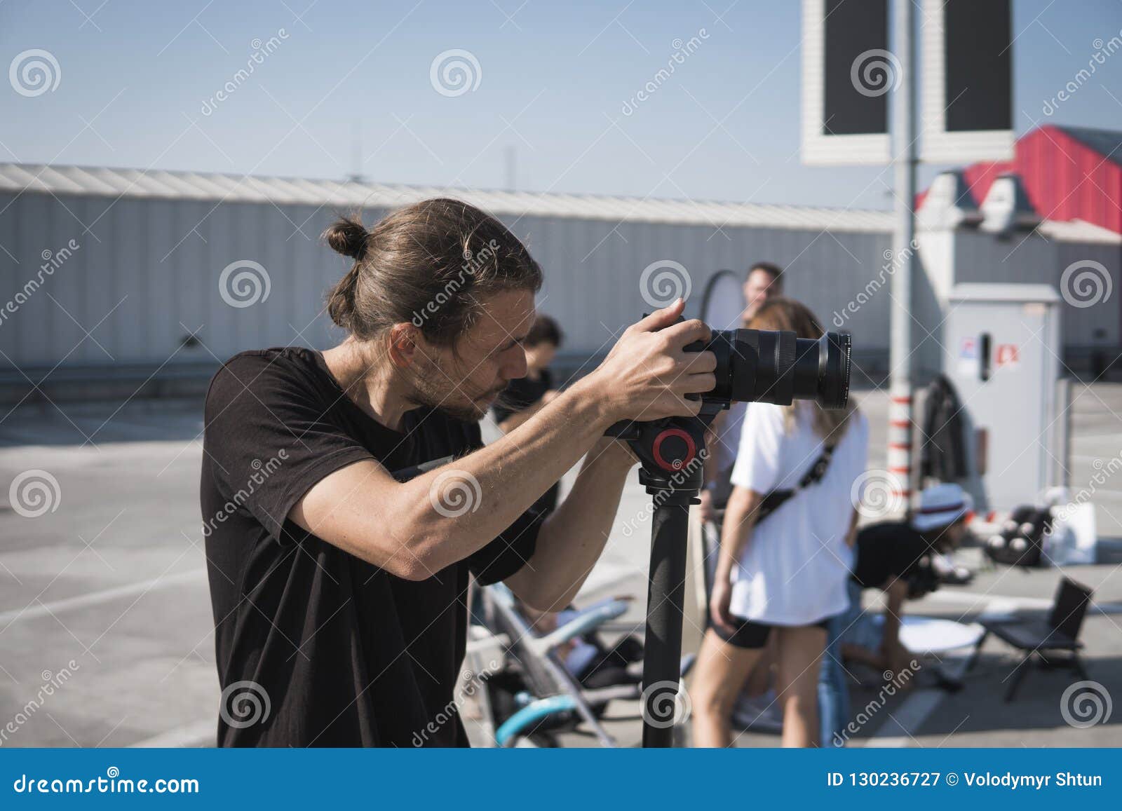 Professional Videographer Using Cinema Digital Video Camera. Stock ...