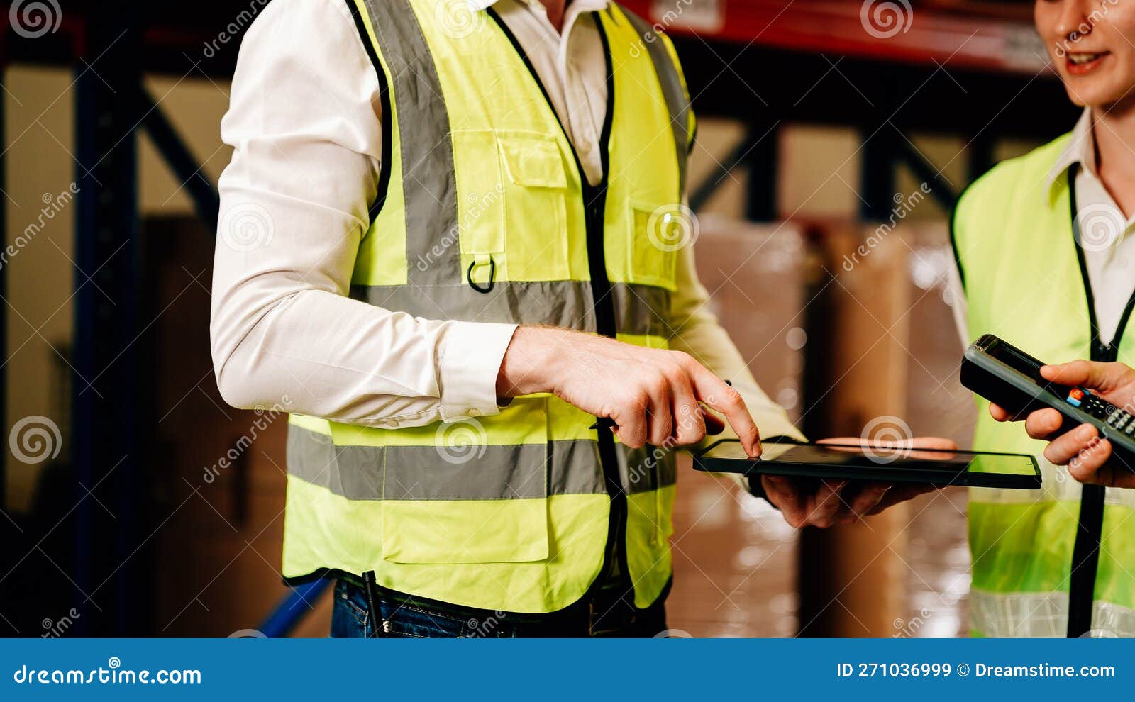 Professional Warehouse Workers with Safety Vest Talking and Discussing ...