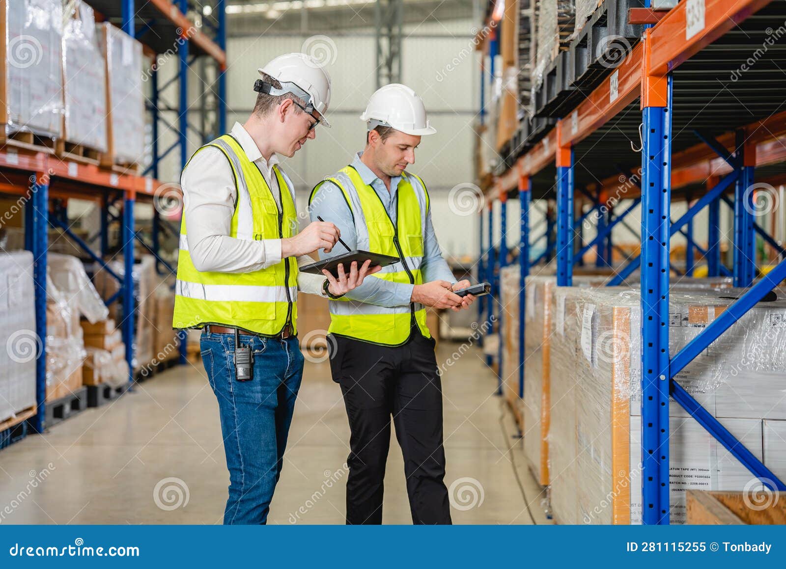 Warehouse Workers Talking Together Checking Goods in Storage Stock ...