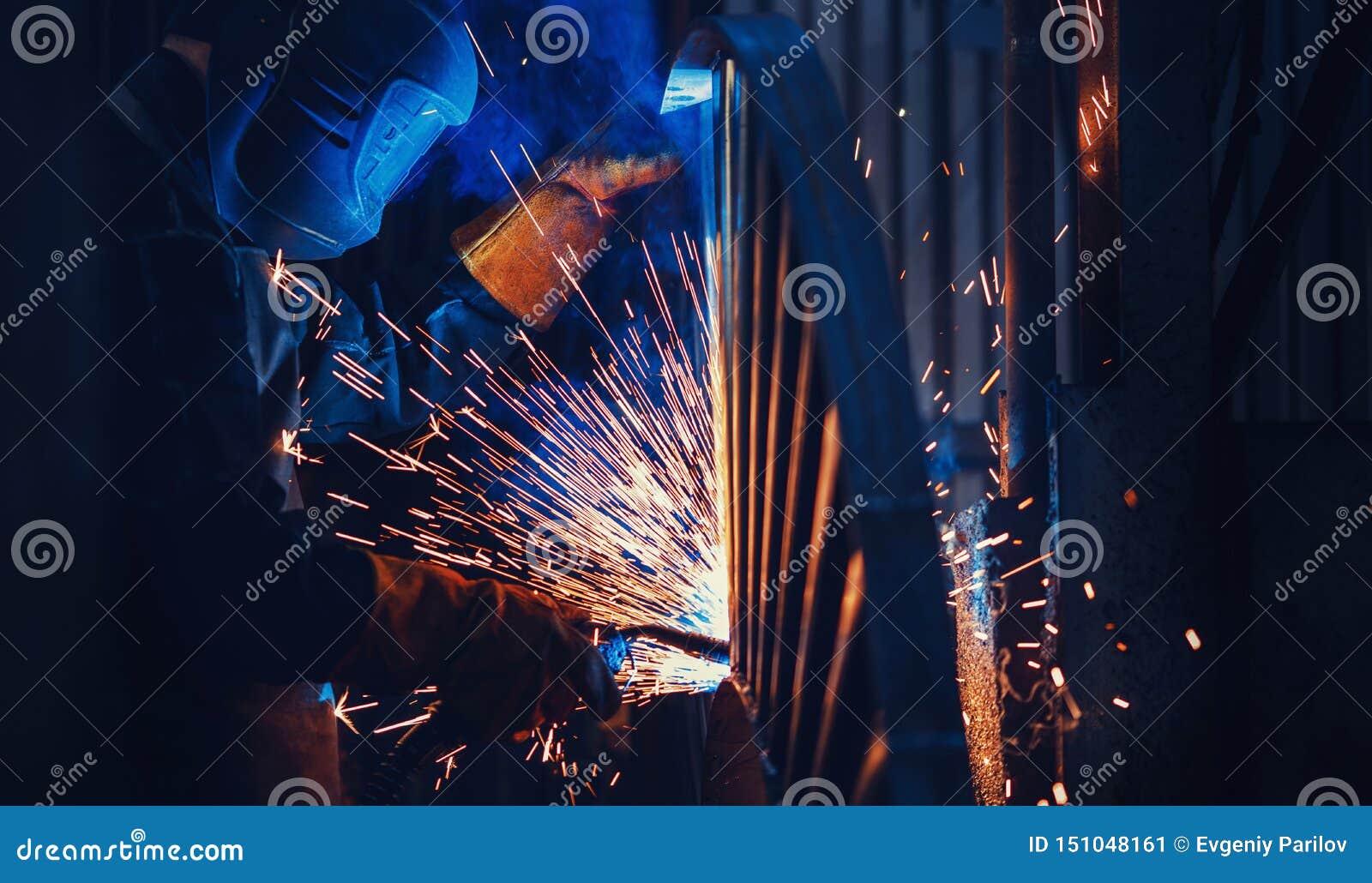 Professional Welder Performs Welding Work on Metal in Protective Mask ...