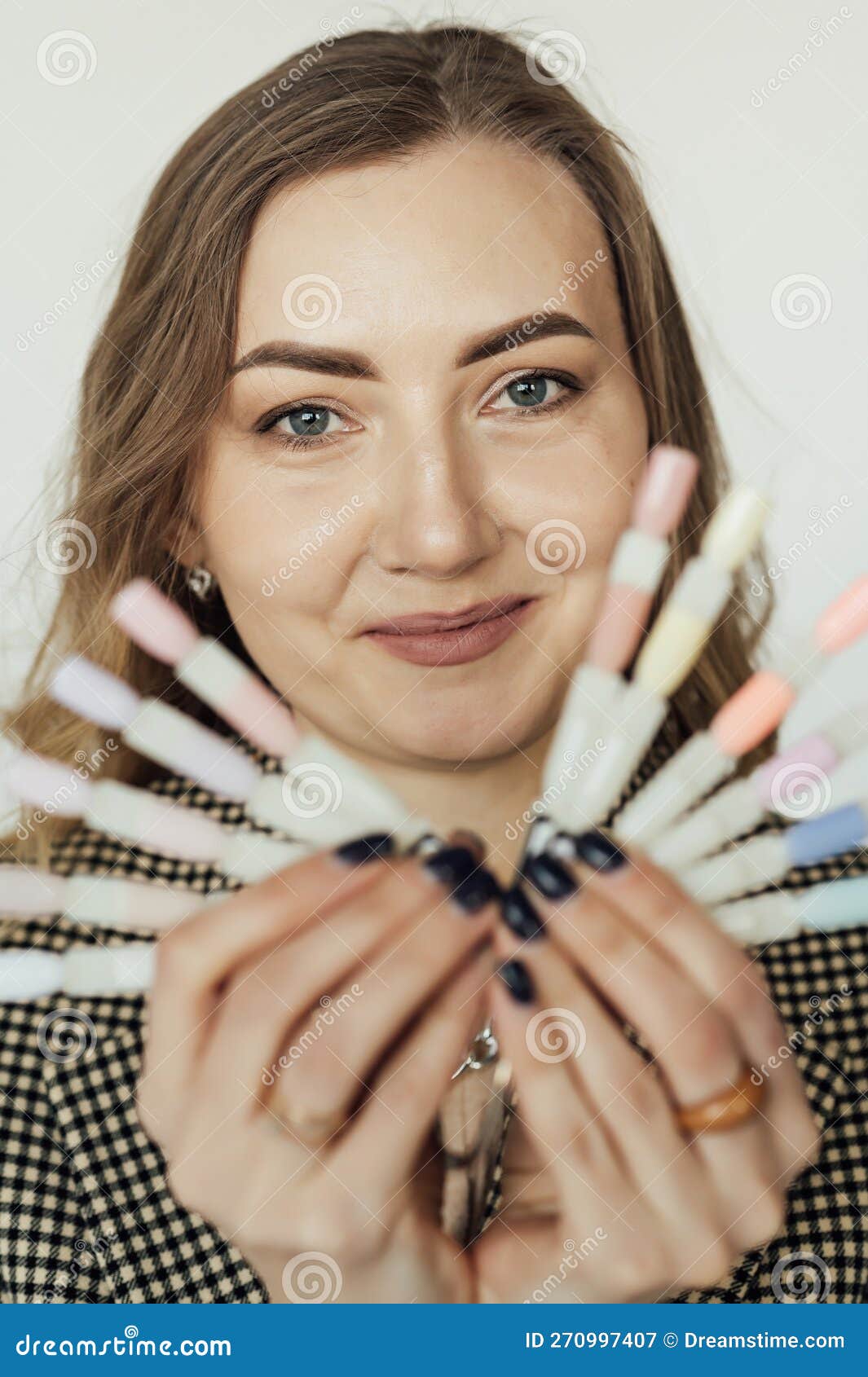 Professional Woman Master of Manicure Posing with Samples of Nails. the ...