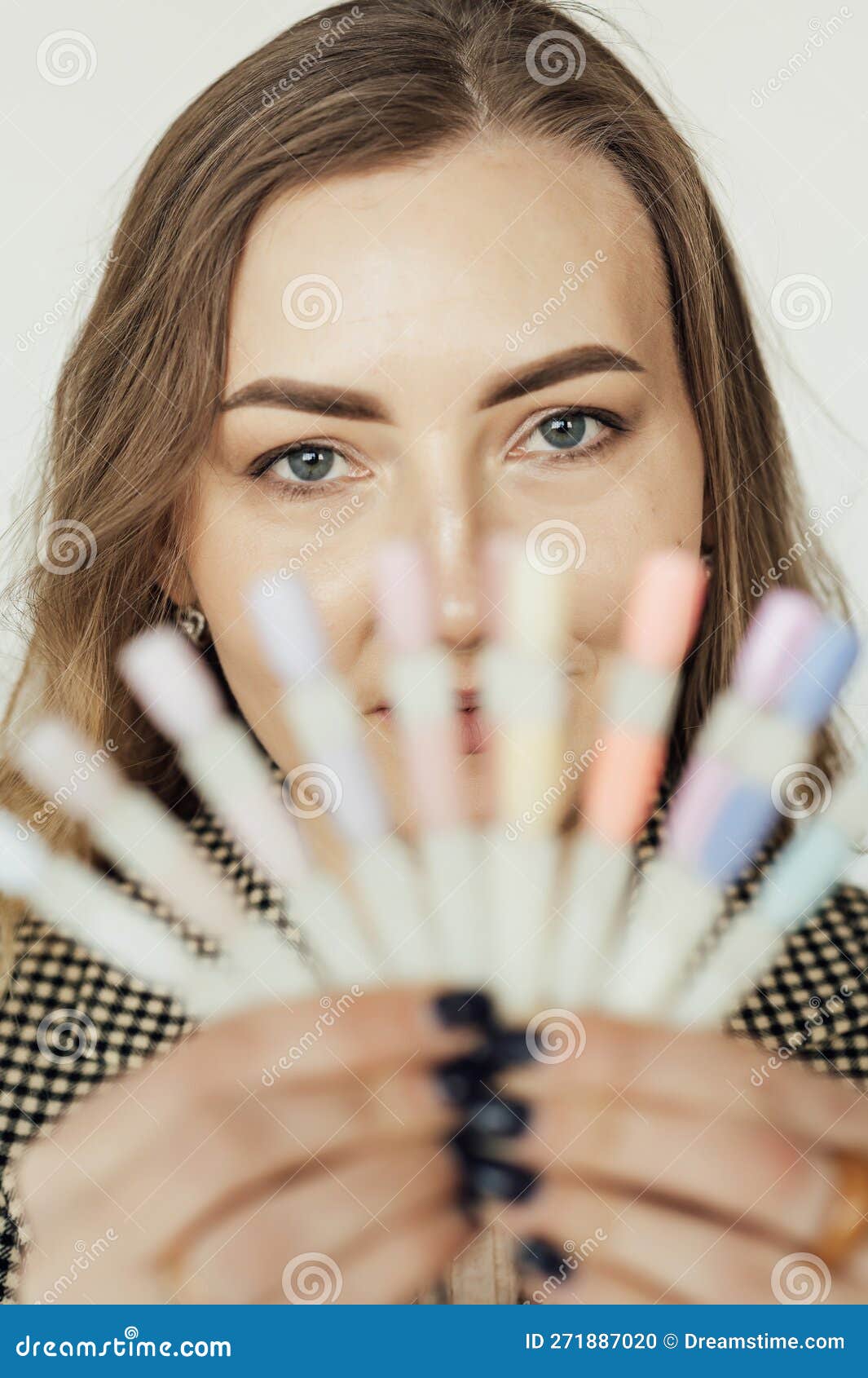 Professional Woman Master of Manicure Posing with Samples of Nails. the ...