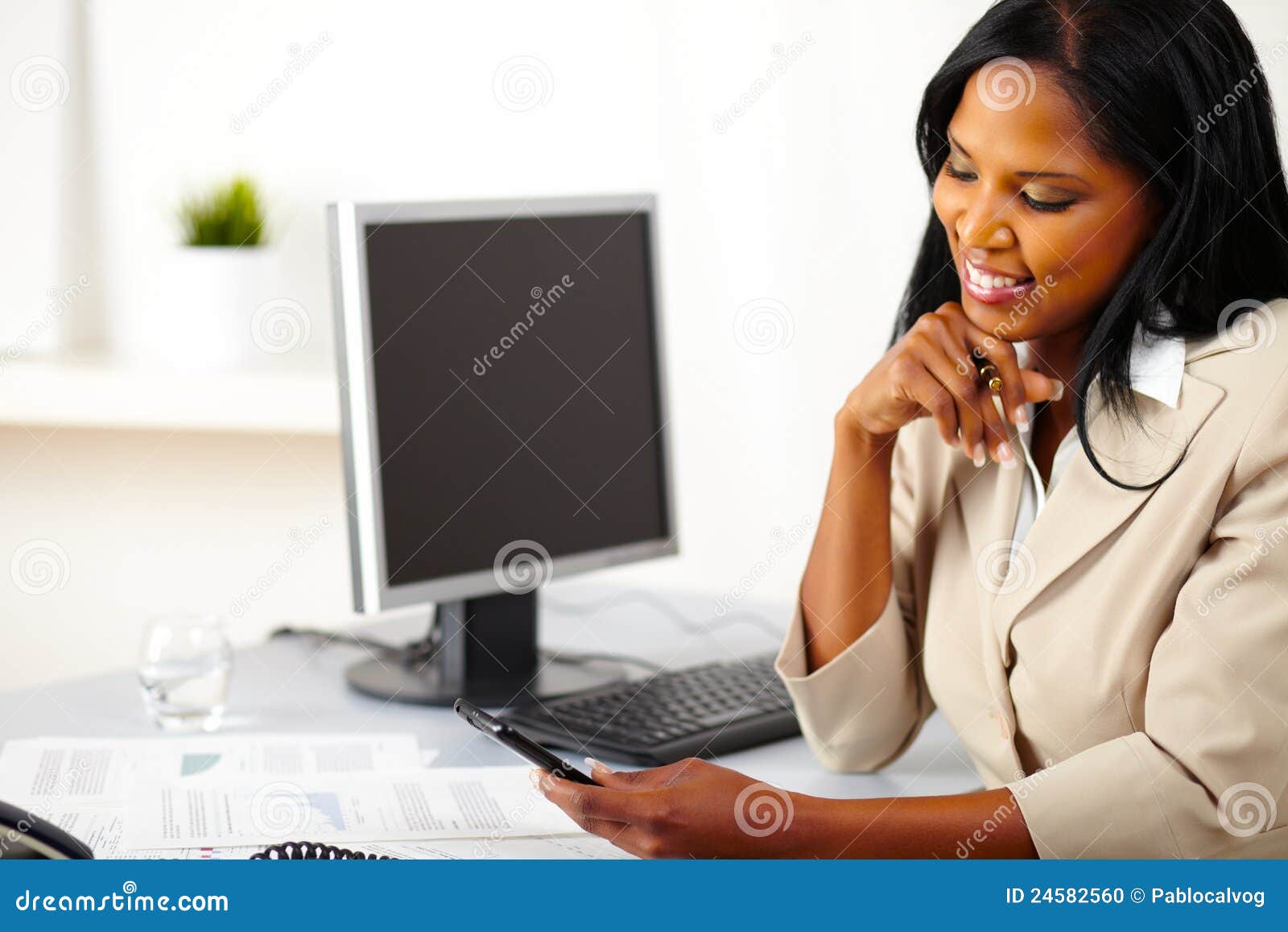 Professional Woman Using a Mobile Phone Stock Photo - Image of american ...