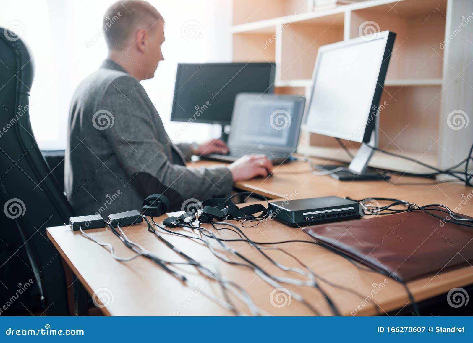 Professional is on the Work. Polygraph Examiner in the Office with His ...