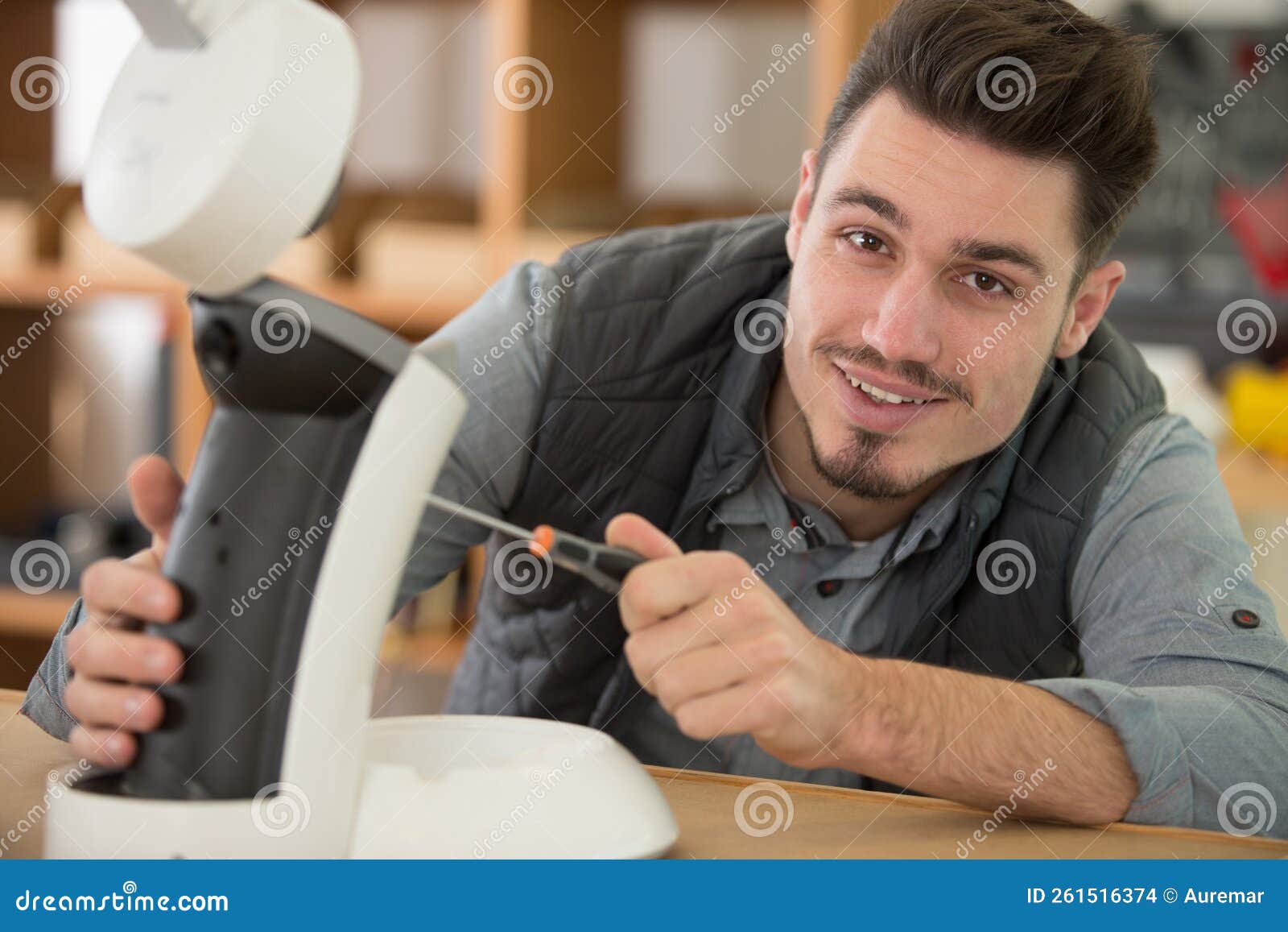 Professional Worker in Eyeglasses and Protective Workwear Fixing Coffee ...