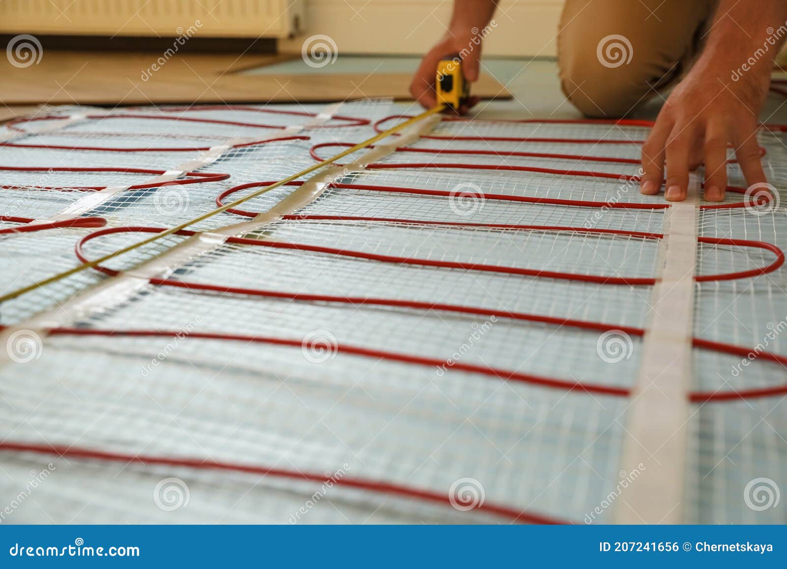 Professional Worker Installing Electric Underfloor Heating System ...