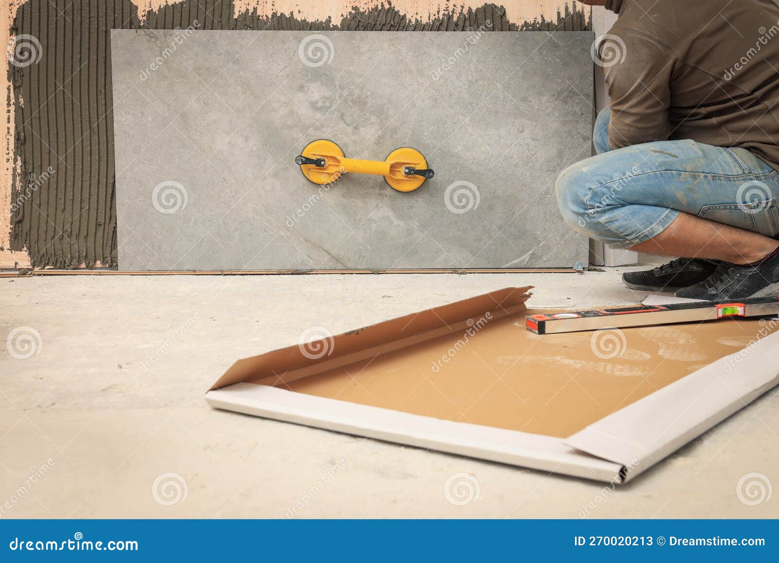 Professional Worker Installing Tile on Wall Indoors, Closeup Stock ...