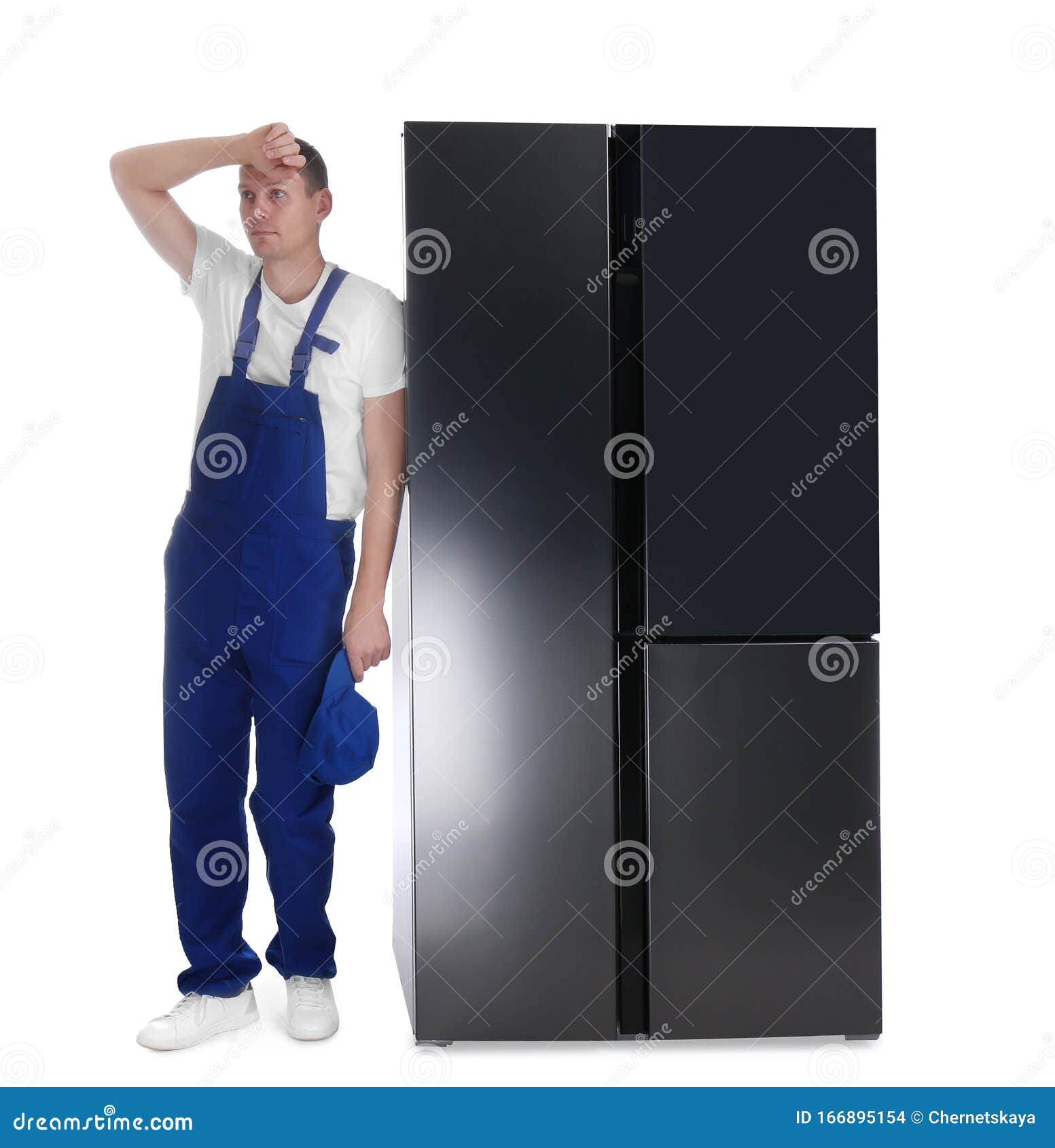 Professional Worker Near Refrigerator on Background Stock Photo - Image ...