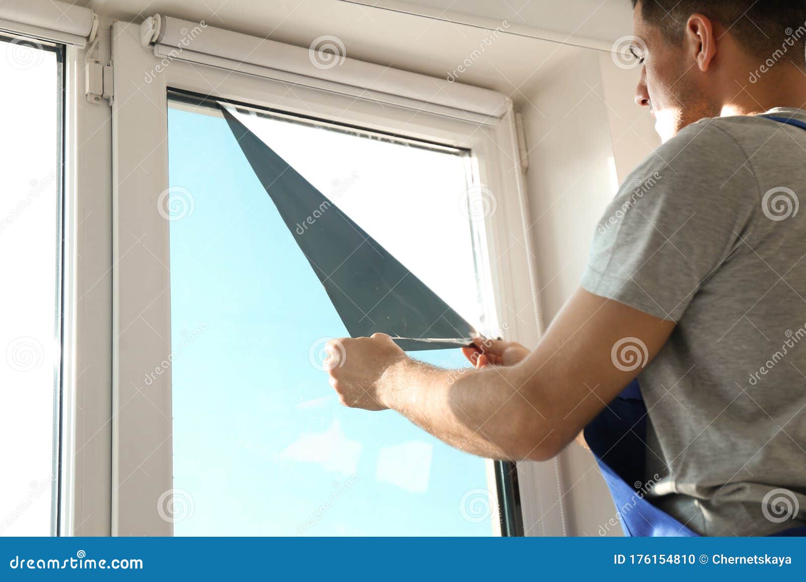 Installing Window Tint Home Stock Photos - Free & Royalty-Free Stock ...