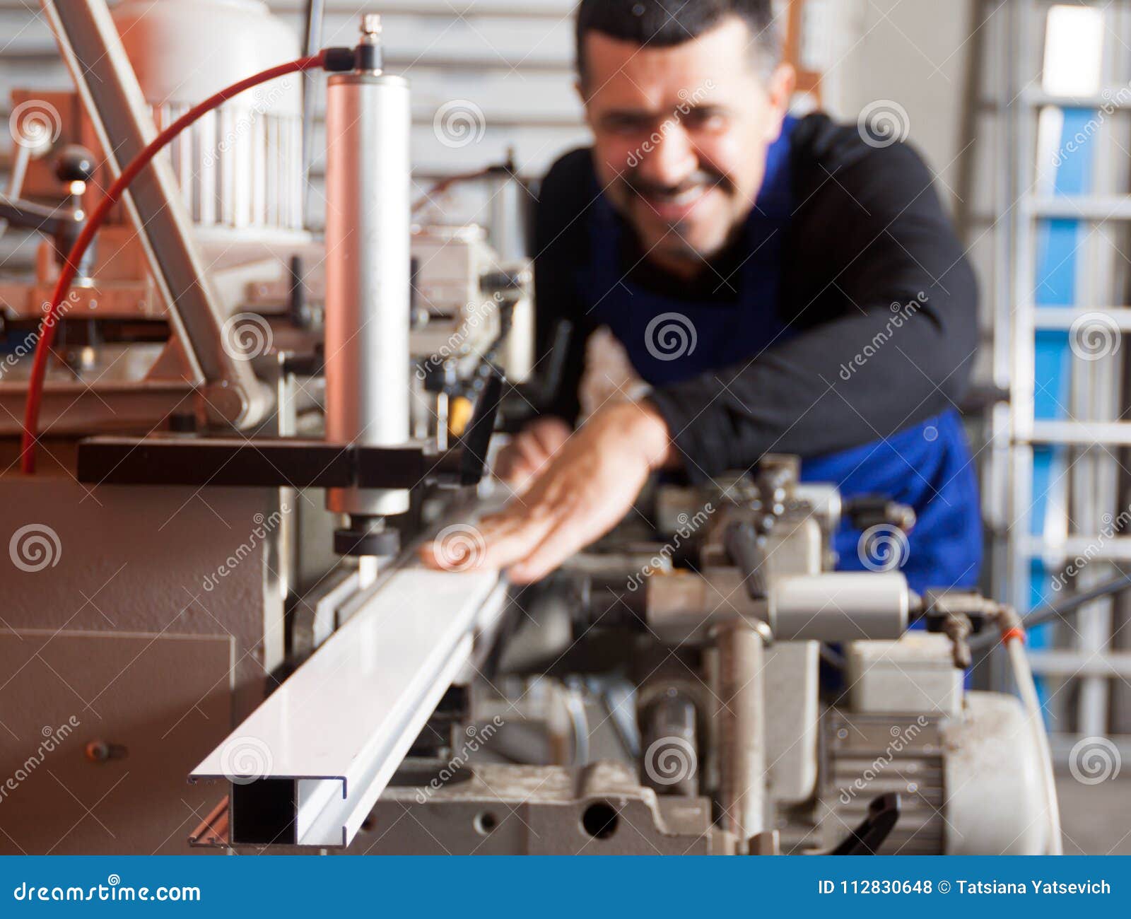 Worker Toiling on a Machine in PVC Factory Stock Photo - Image of ...