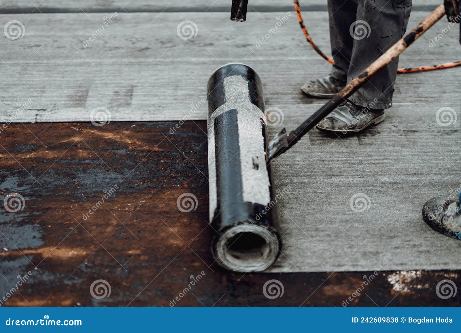 Professional Construction Worker Installing and Waterproofing House ...