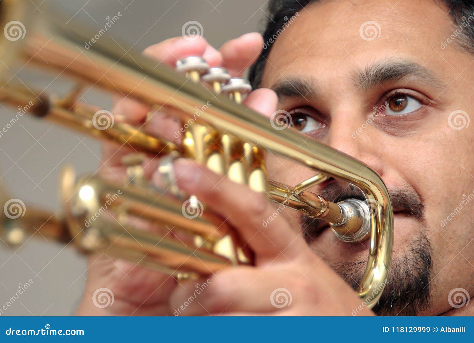 Young Man Playing Trumpet in Studio Stock Image - Image of music ...