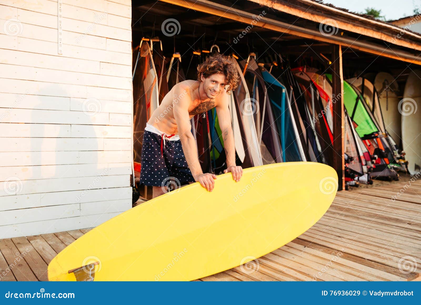 Professional Young Surfer Getting Surf Board Ready Stock Image - Image ...