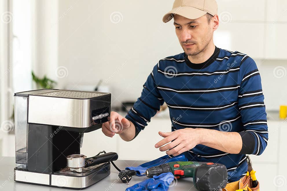 Professional Young Worker Fixing Coffee Machine Stock Photo - Image of ...