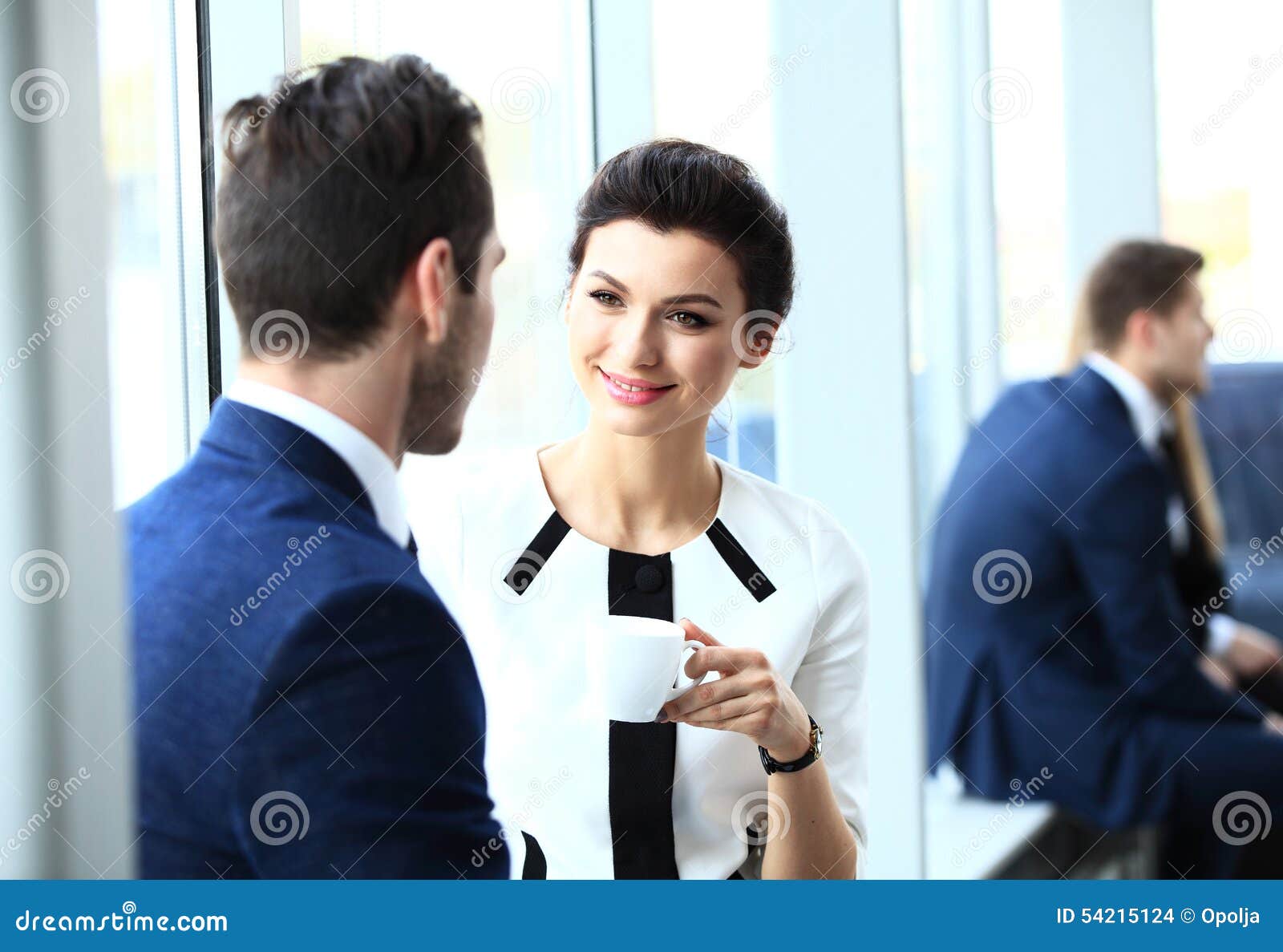 Professionals Chatting during a Coffee Break Stock Photo - Image of ...