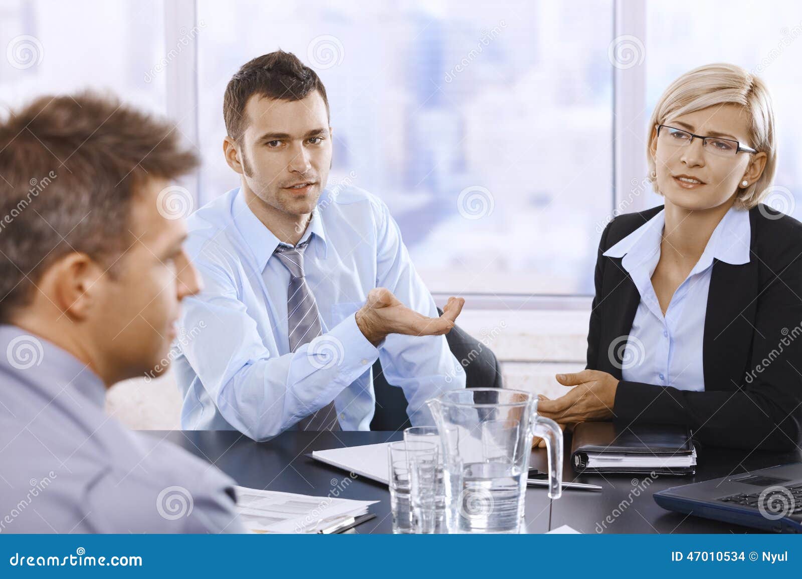 Professionals at Discussion Stock Photo - Image of explaining, female ...