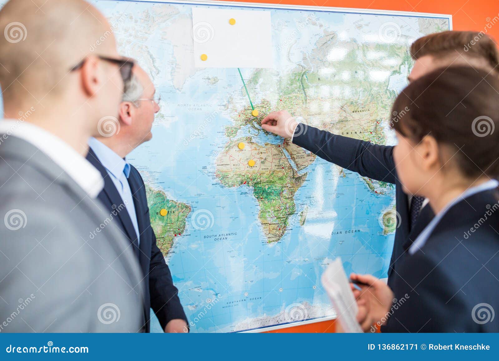 Professionals Planning Locations on Map for Global Business Stock Image ...