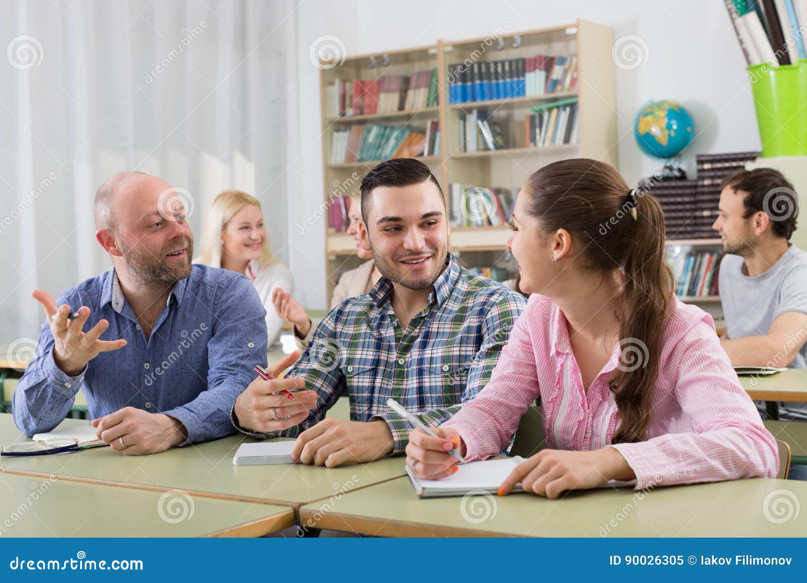 Professionals Taking Notes at Training Session Stock Image - Image of ...