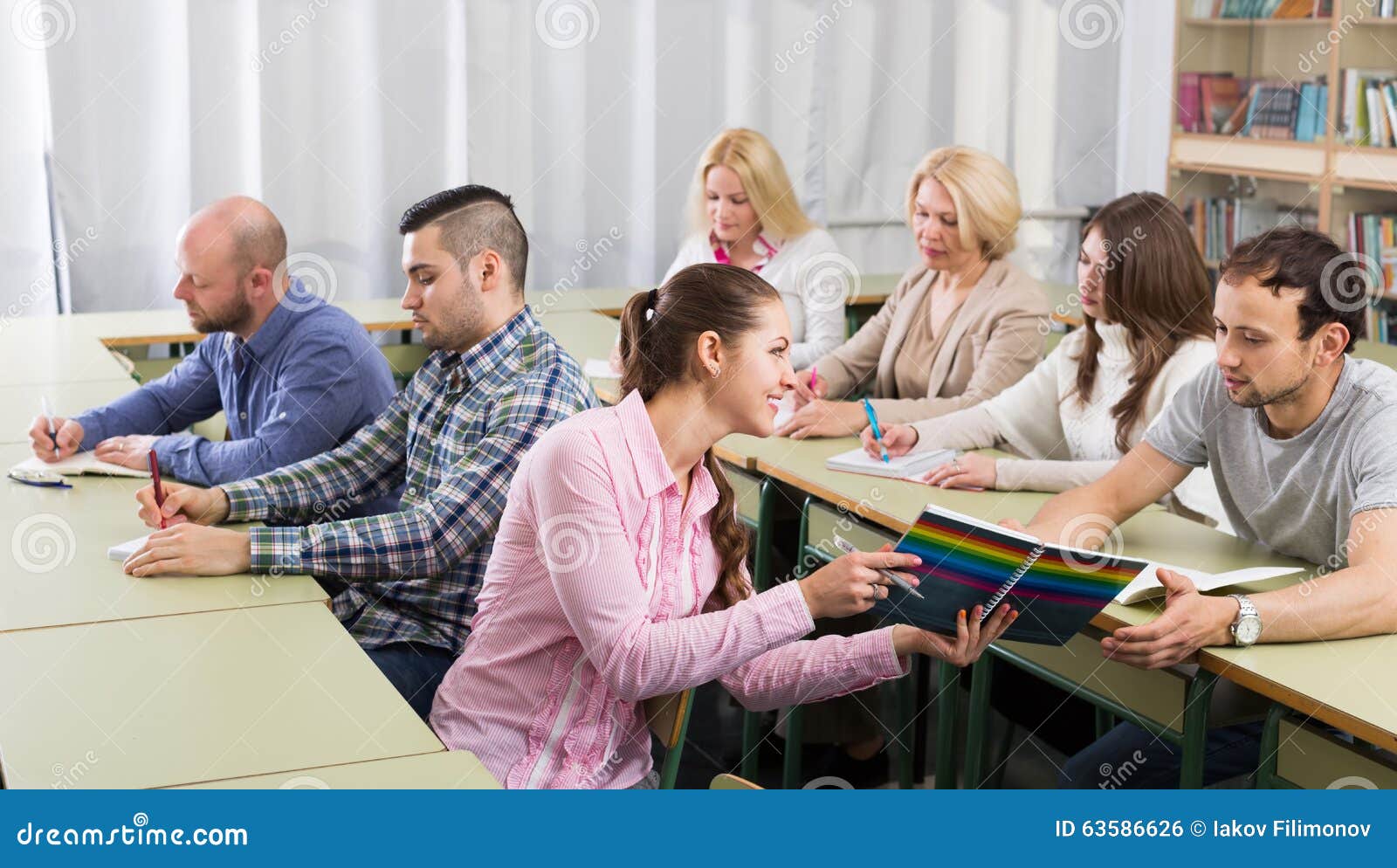 Professionals Taking Notes at Training Session Stock Photo - Image of ...