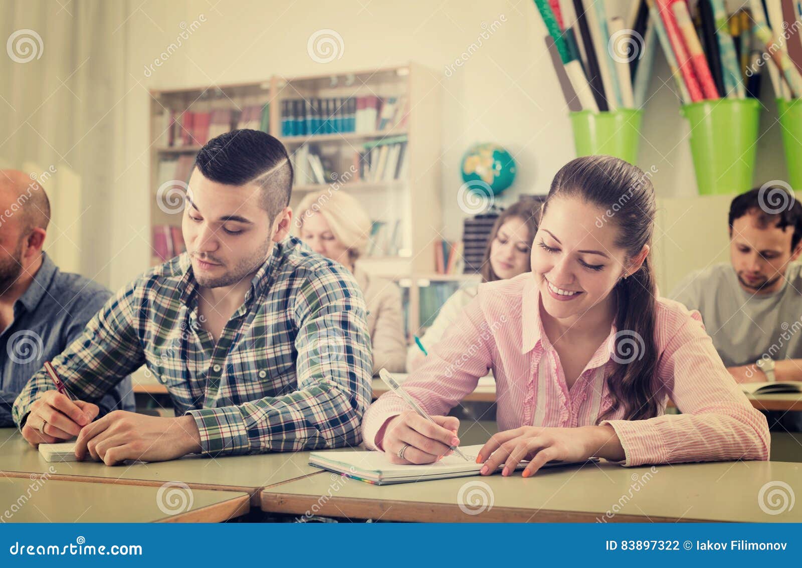 Professionals Taking Notes at Training Session Stock Photo - Image of ...