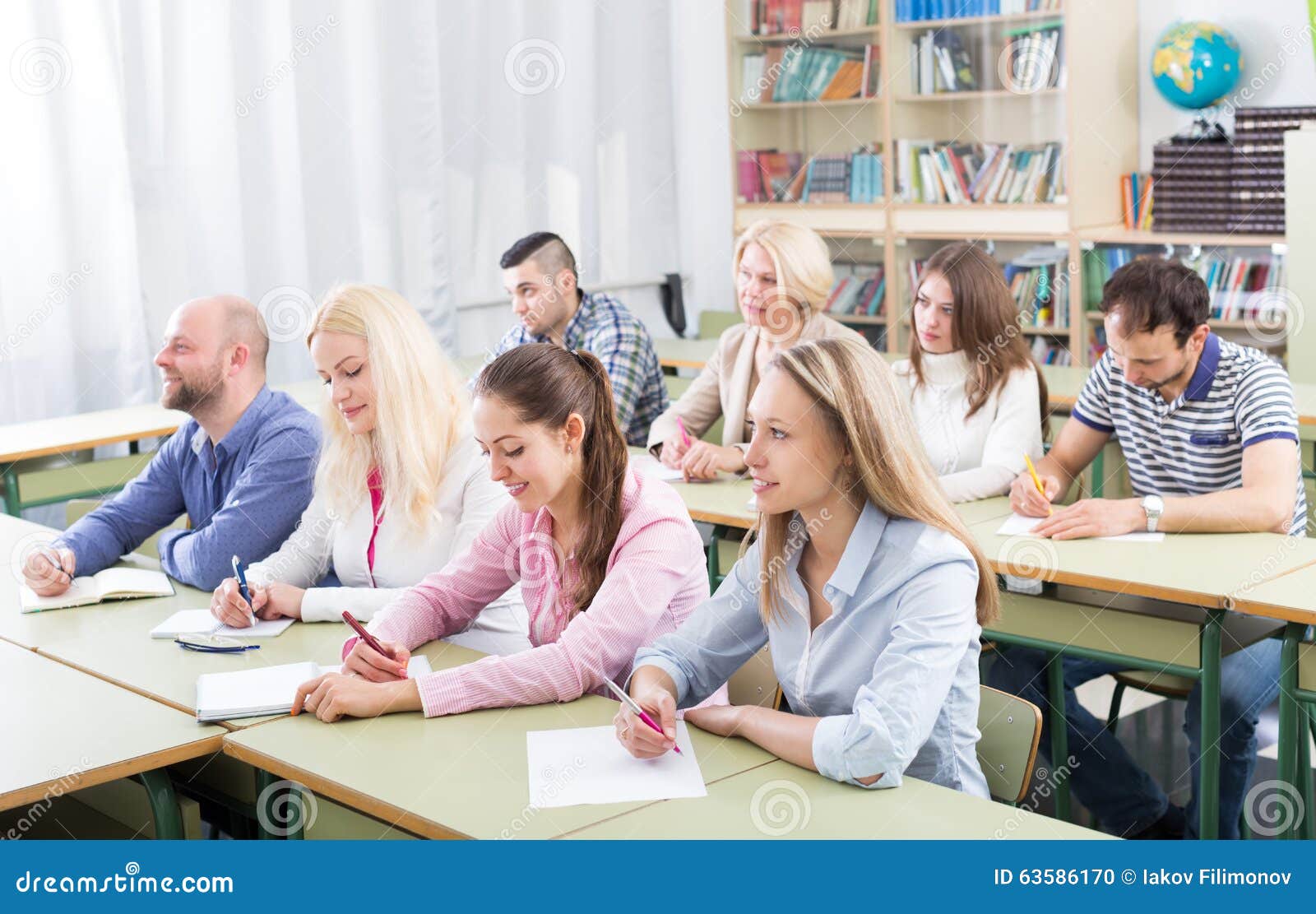 Professionals Taking Notes at Training Session Stock Photo - Image of ...