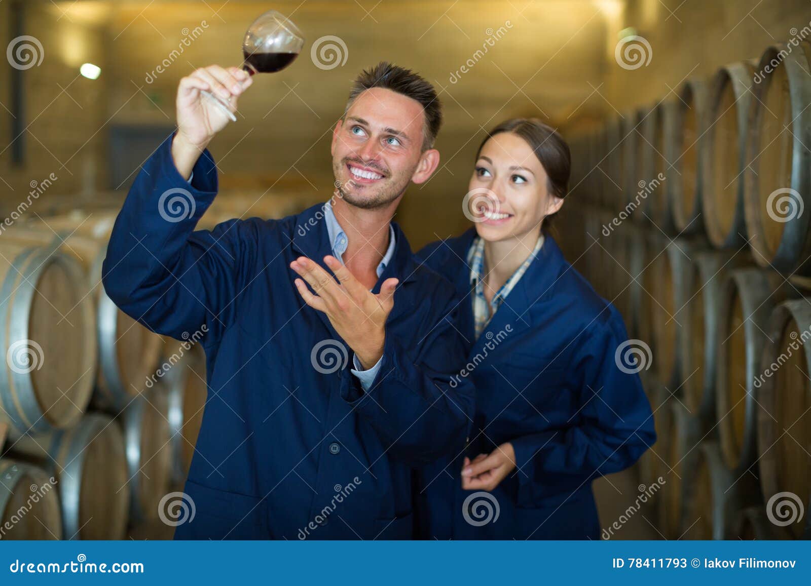 Professionals in Uniform Holding Glass Wine in Big Cellar Stock Image ...