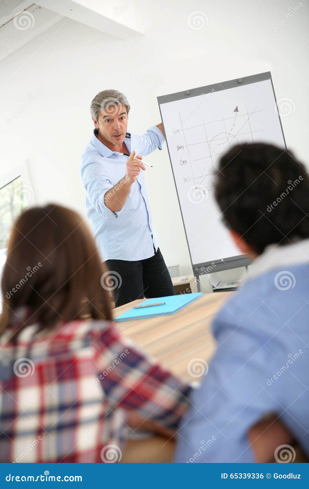 Professor in Class Having a Presentation Stock Photo - Image of teacher ...