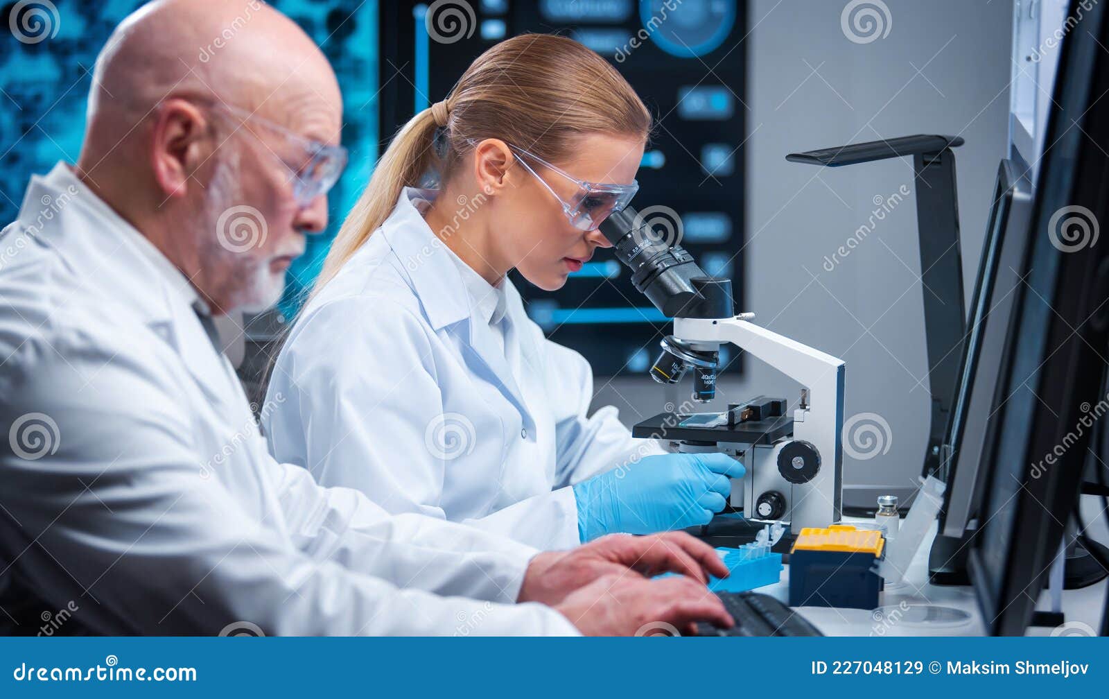 Professor and Doctor Work in a Modern Scientific Laboratory Using ...