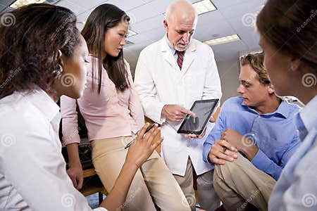 Professor Having Discussion with College Students Stock Photo - Image ...