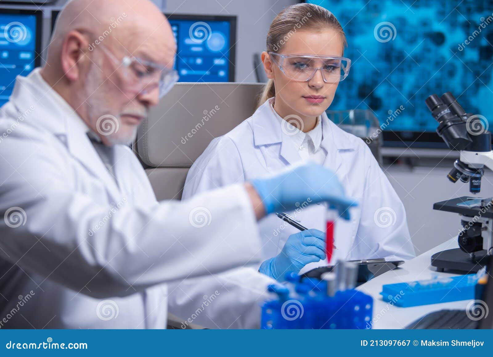 Professor and His Young and Professional Laboratory Assistant are Doing ...