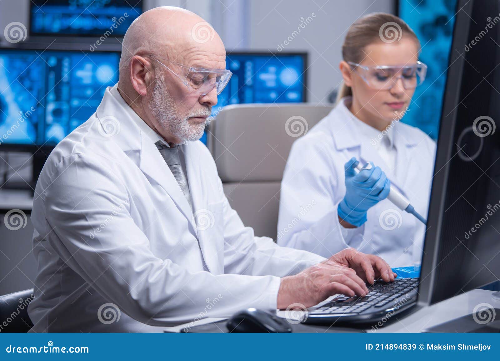 Professor and His Young and Professional Laboratory Assistant are Doing ...