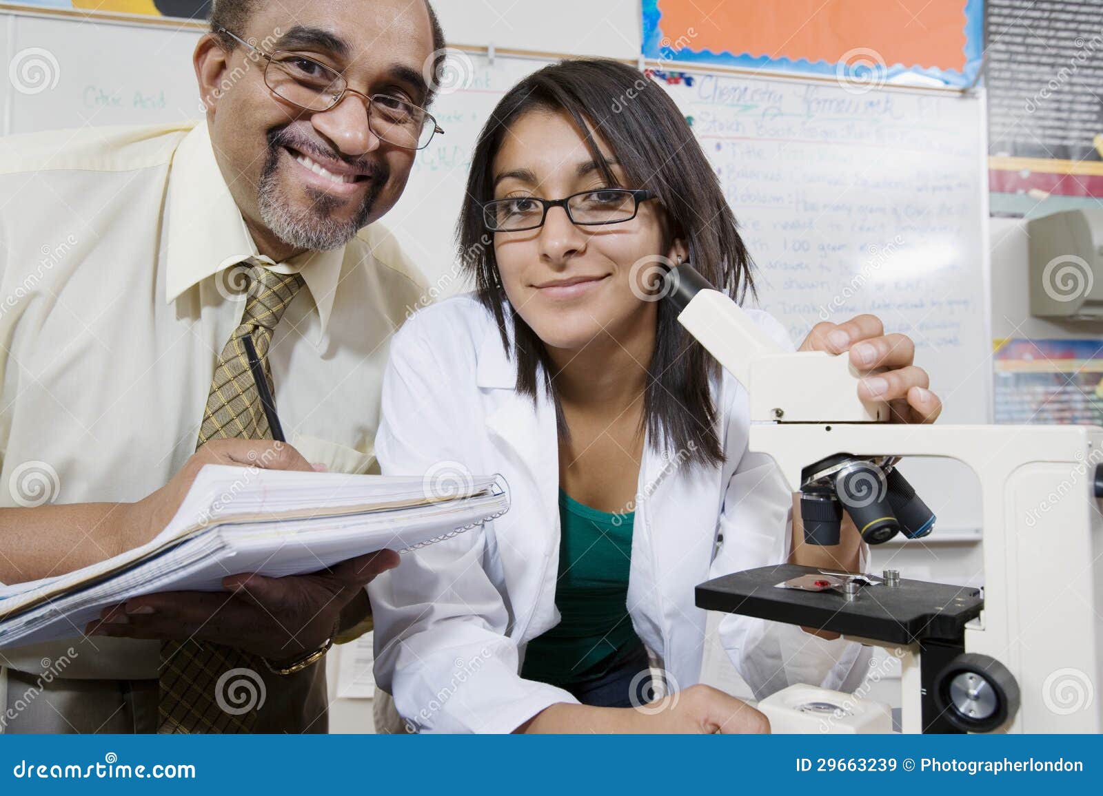 Professor with Student in Science Lab Stock Image - Image of college ...
