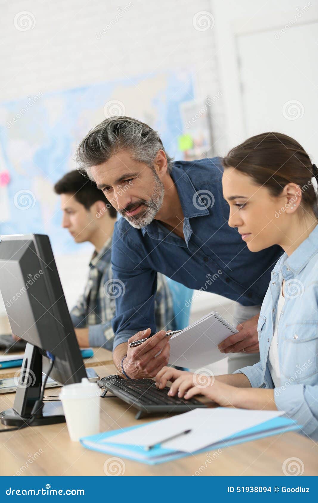Professor with Student Working on Desktop Computer Stock Photo - Image ...
