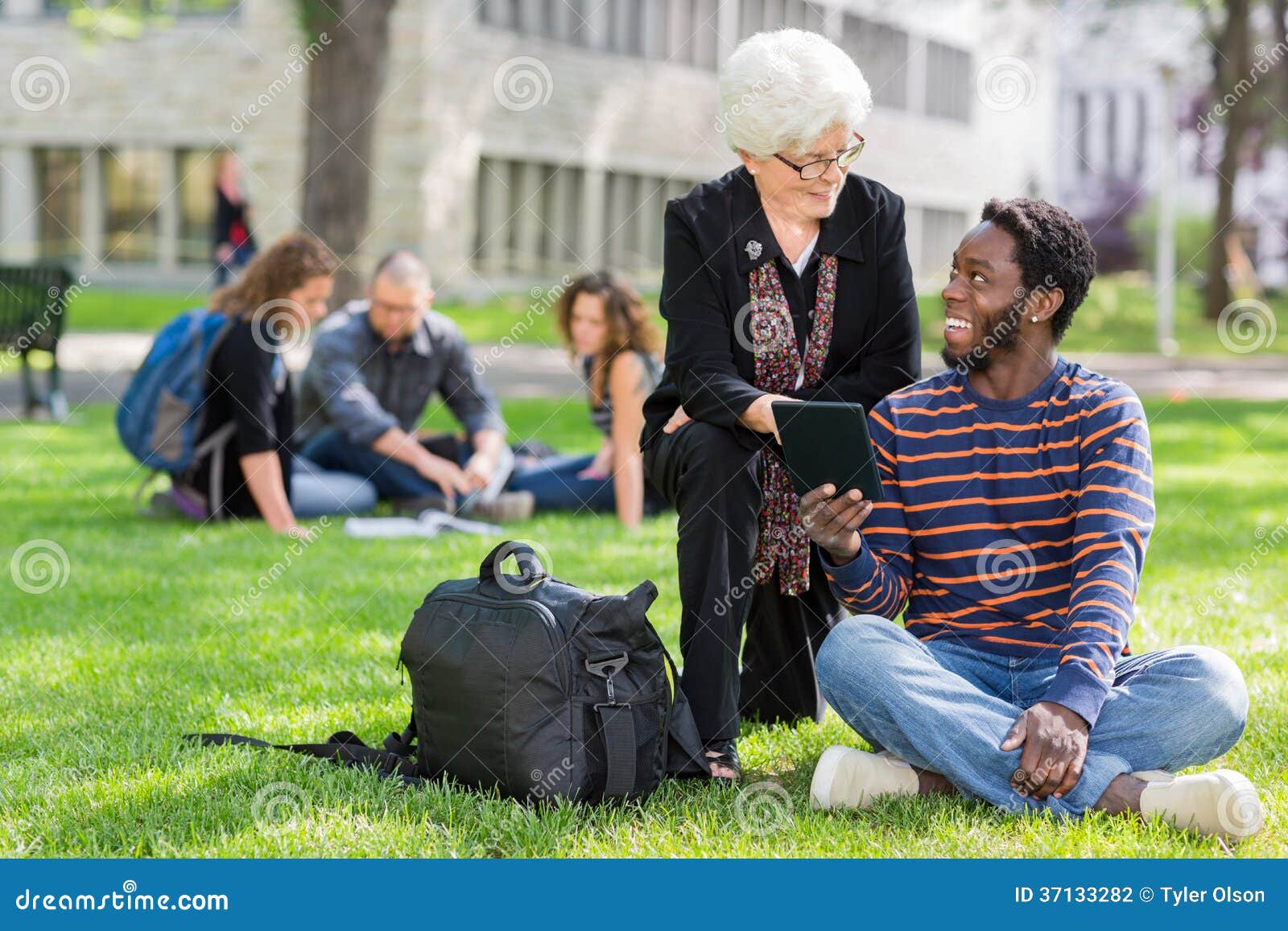 Professor and Student Working Together Outdoors Stock Photo - Image of ...