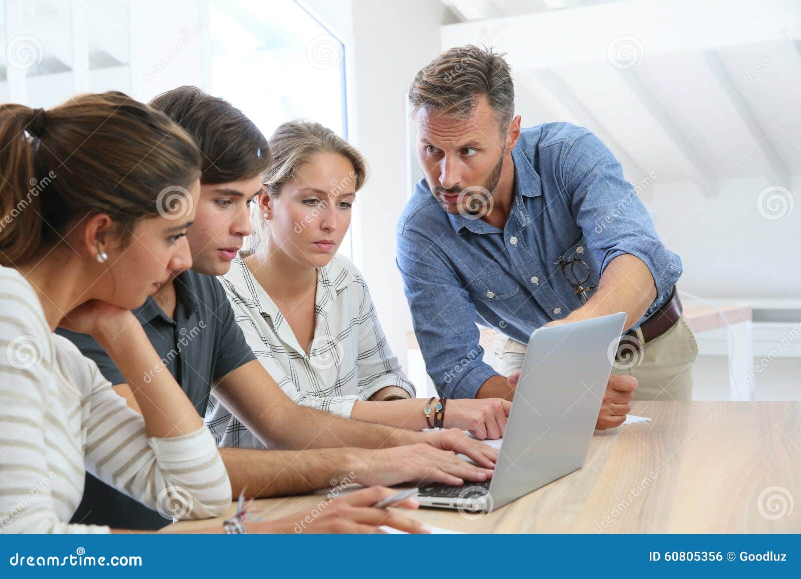 Professor and Students Working on Laptop Stock Photo - Image of class ...