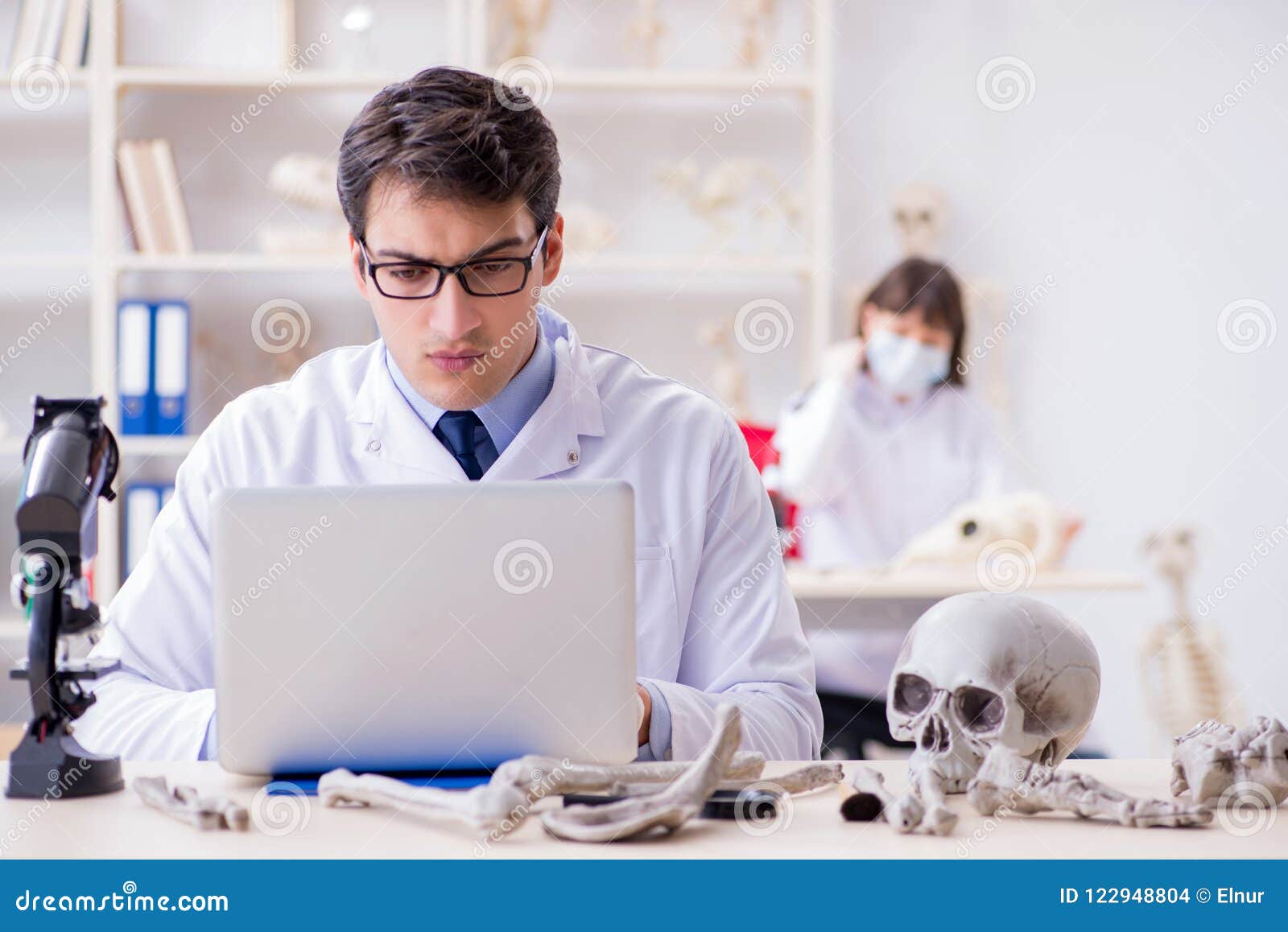 The Professor Studying Human Skeleton in Lab Stock Photo - Image of ...