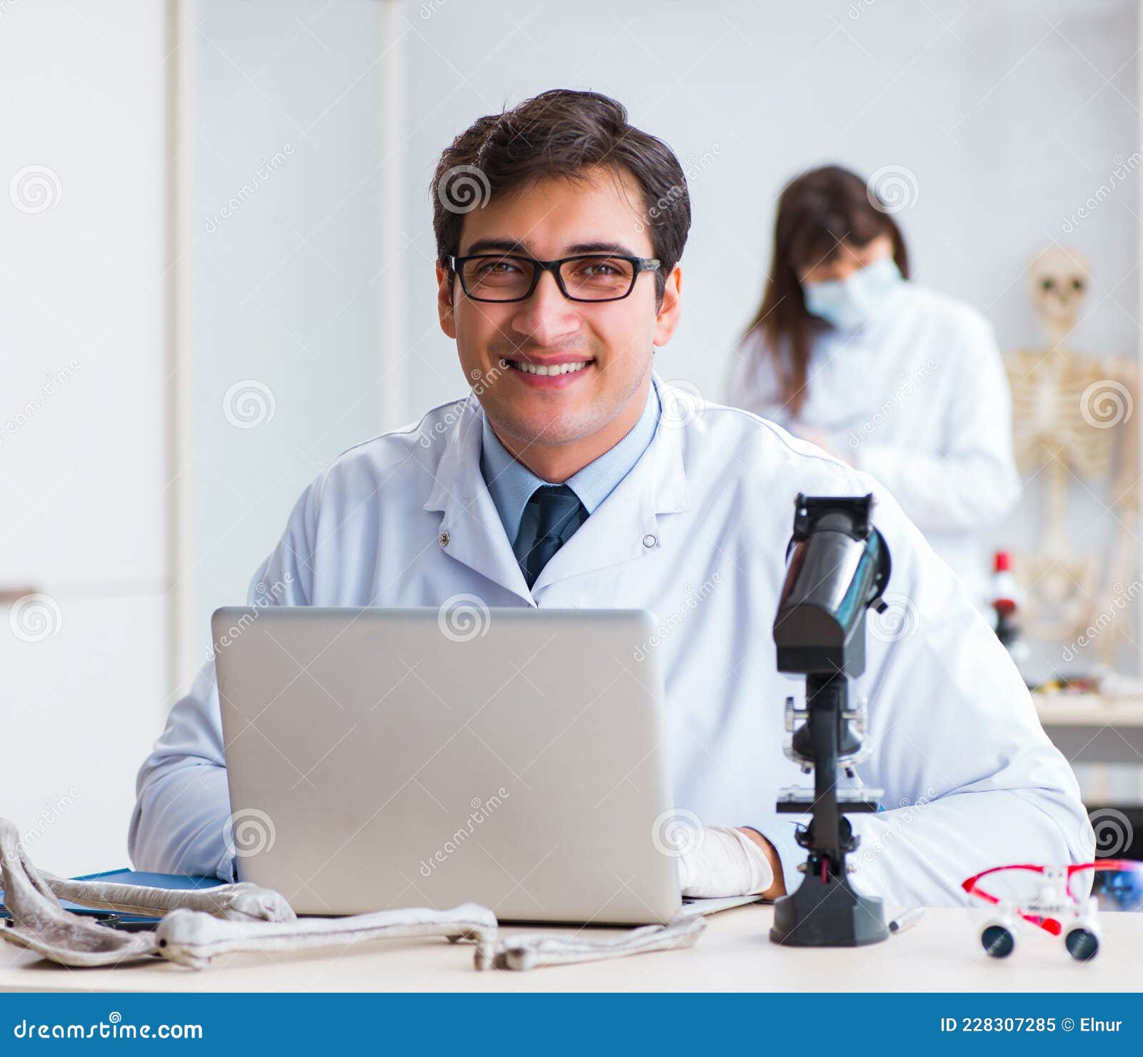 Professor Studying Human Skeleton in Lab Stock Image - Image of ...