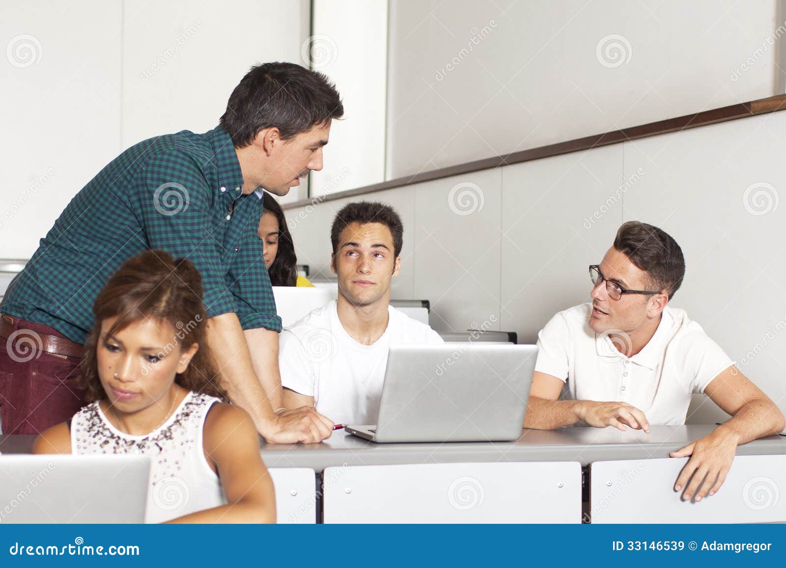 Professor Talking To a Male Students Stock Image - Image of computers ...