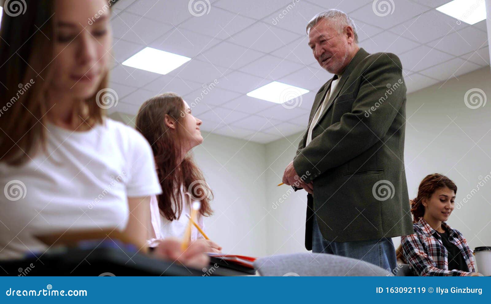 Professor Talks To Student, Smile and Laugh. Stock Image - Image of ...
