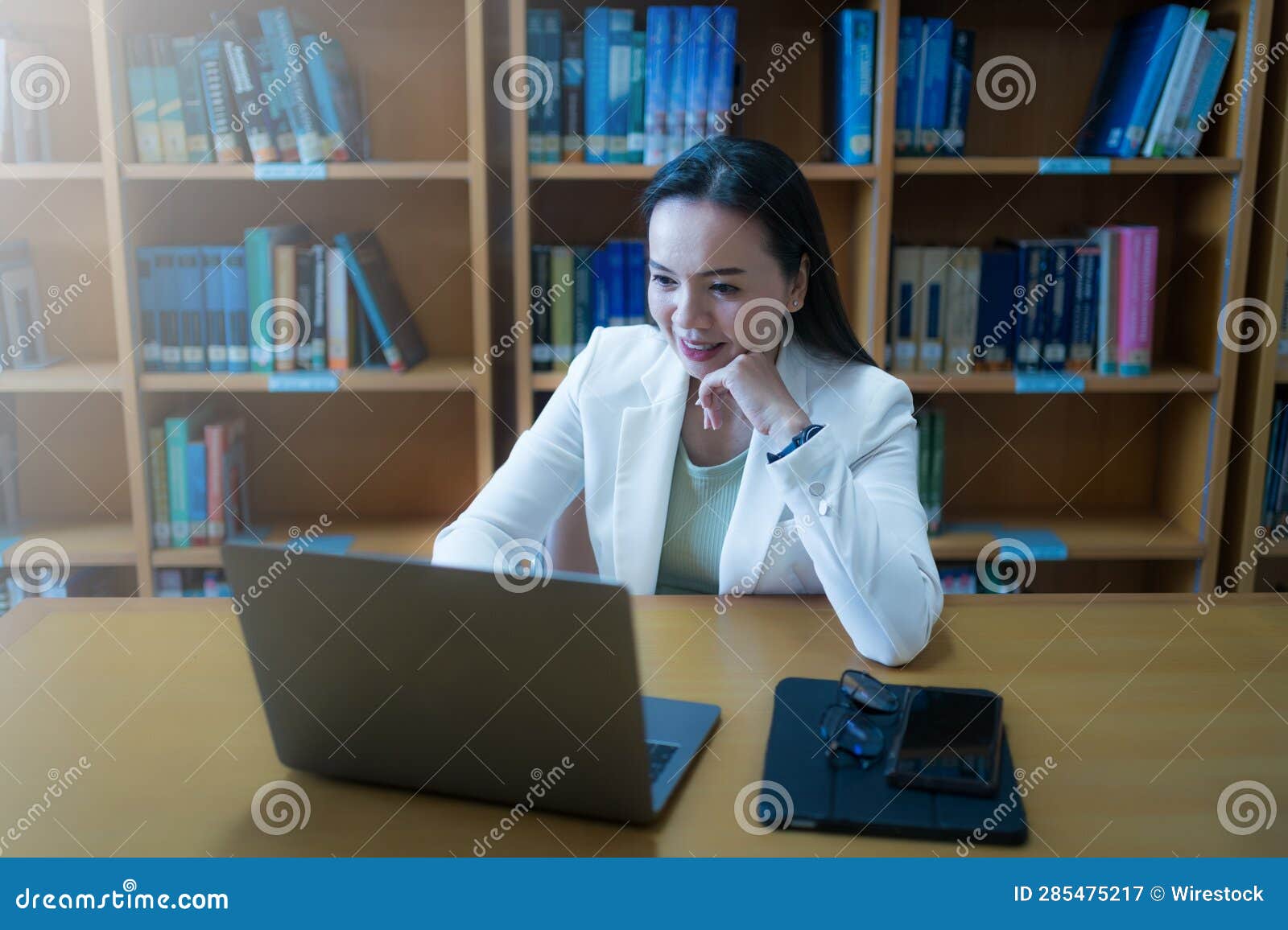 Professor Teaching an Online Class at the Library Stock Image - Image ...